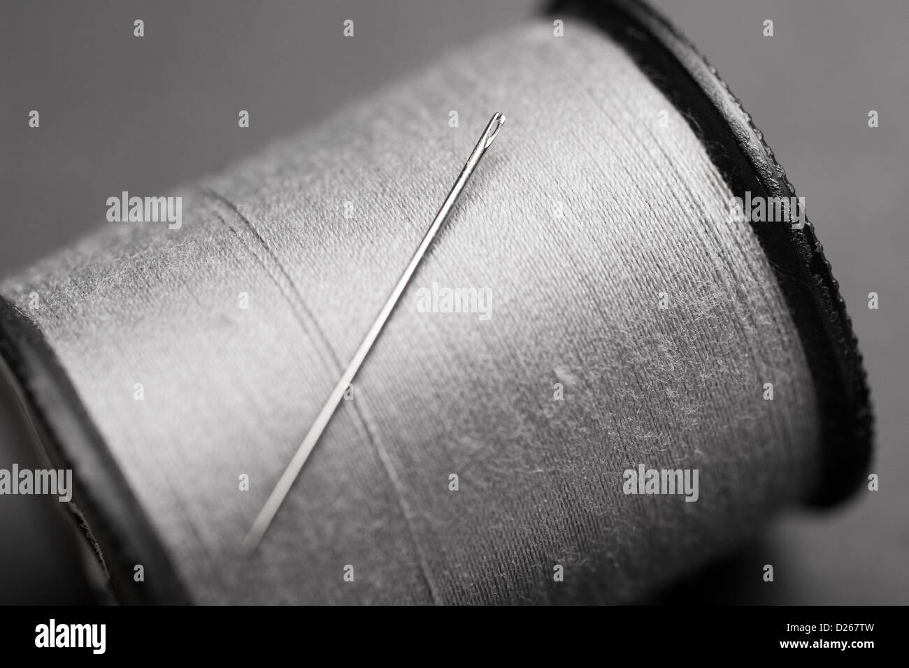 Needle and Thread Stock Photo - Alamy