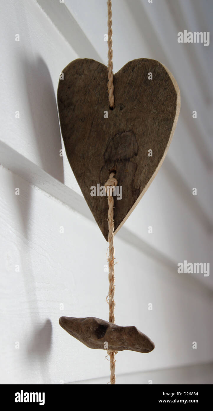 Wooden hanging heart detail/decoration Stock Photo - Alamy