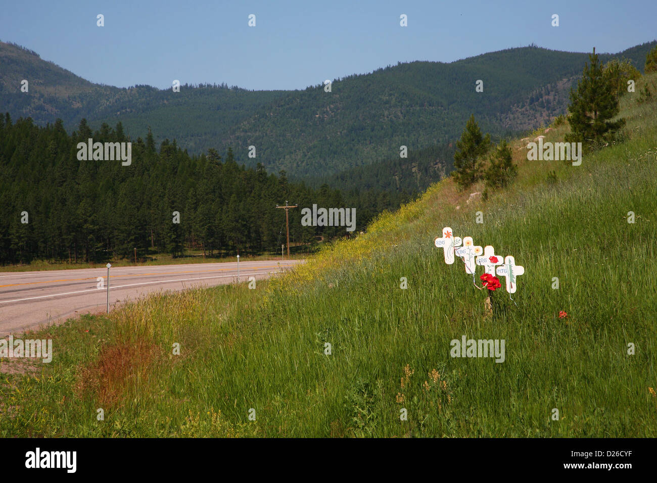Roadside cross marks fatality site Stock Photo - Alamy