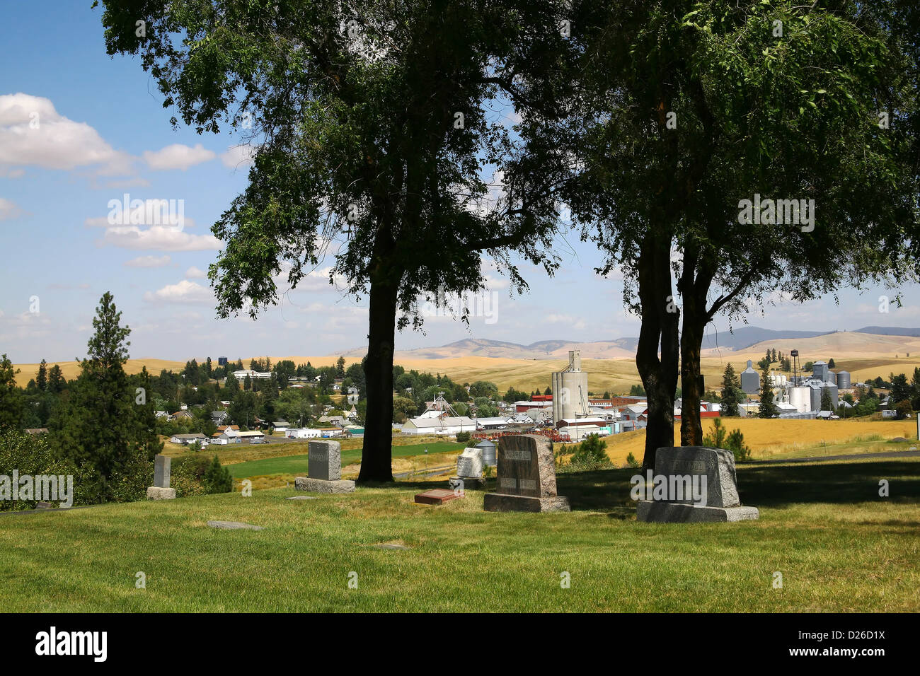 Rural cemetery overlooks farm town Stock Photo - Alamy