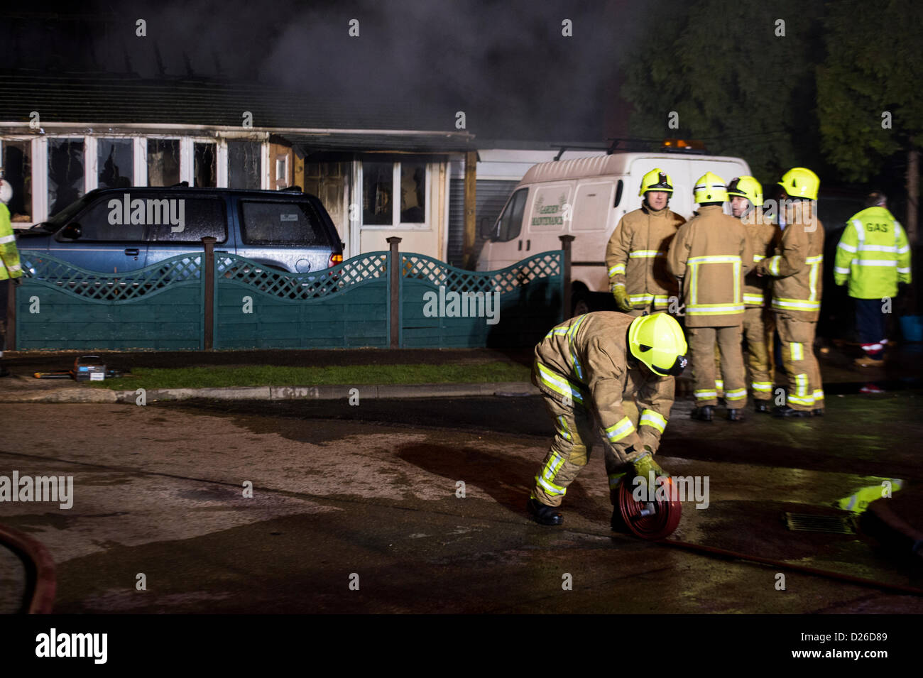 Firefighters tackling a blaze at a bungalow that caught fire after the ...