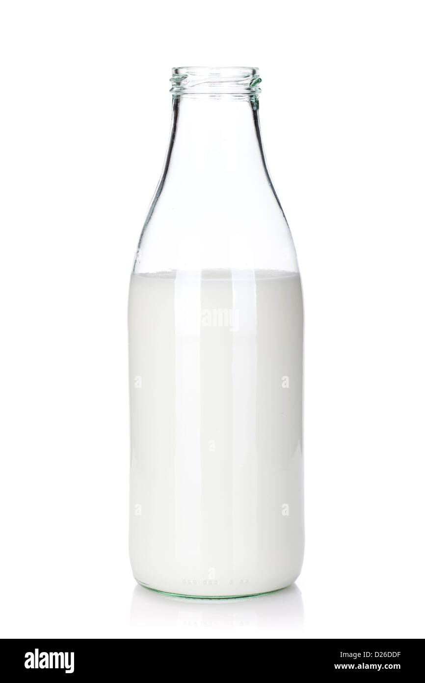 Opened bottle with milk. Isolated on white background Stock Photo - Alamy