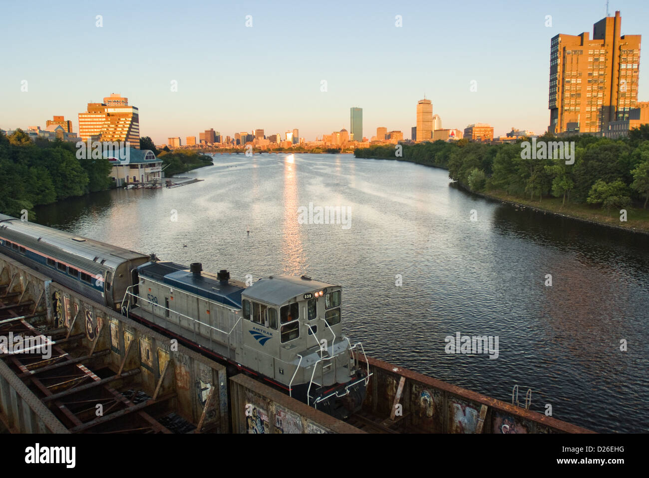 An Amtrak passenger train crosses the CSX Transportation Grand Junction Line railway bridge over ...