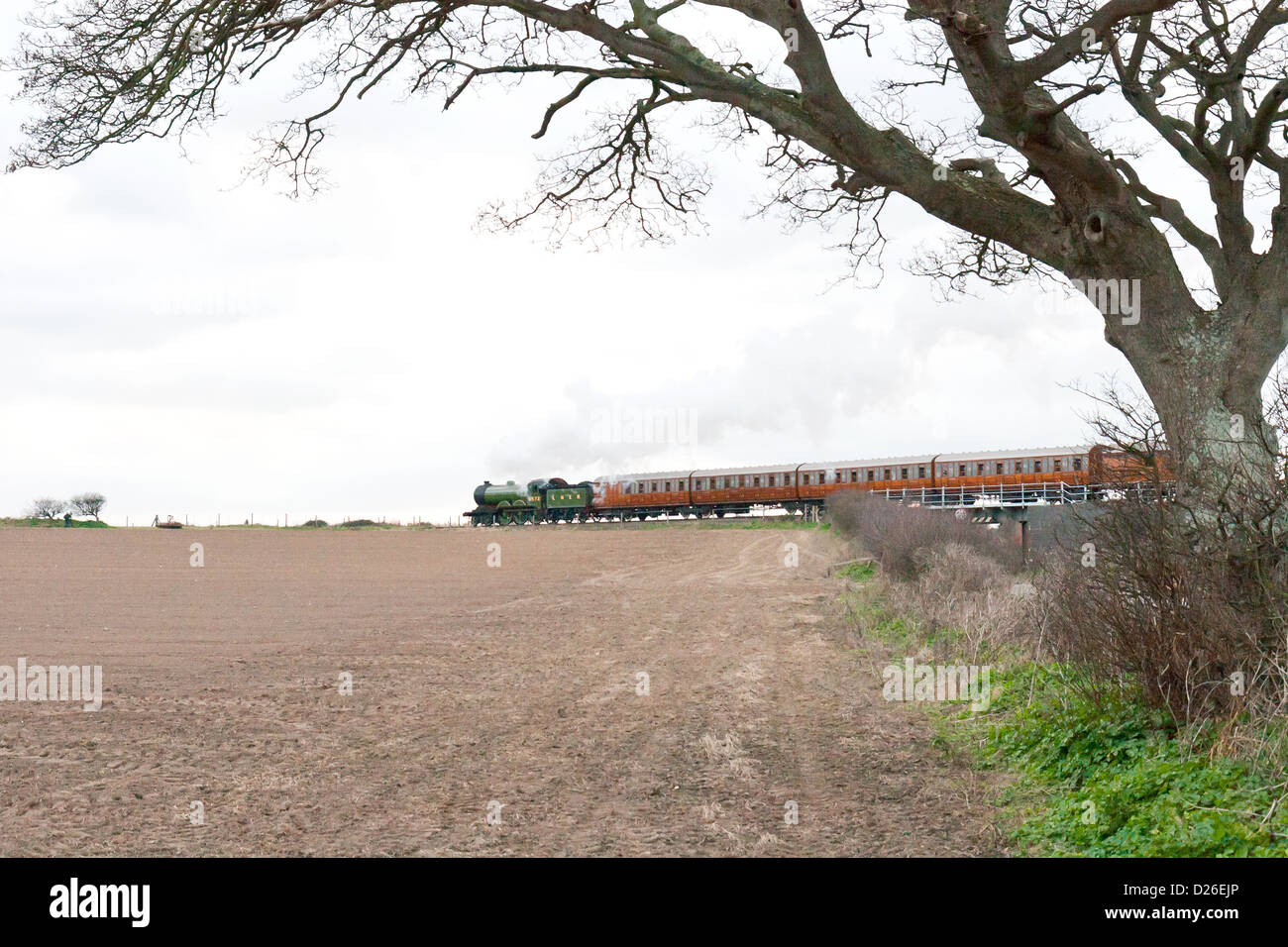 Steam locomotive pulling a passenger train on the North Norfolk Railway ...
