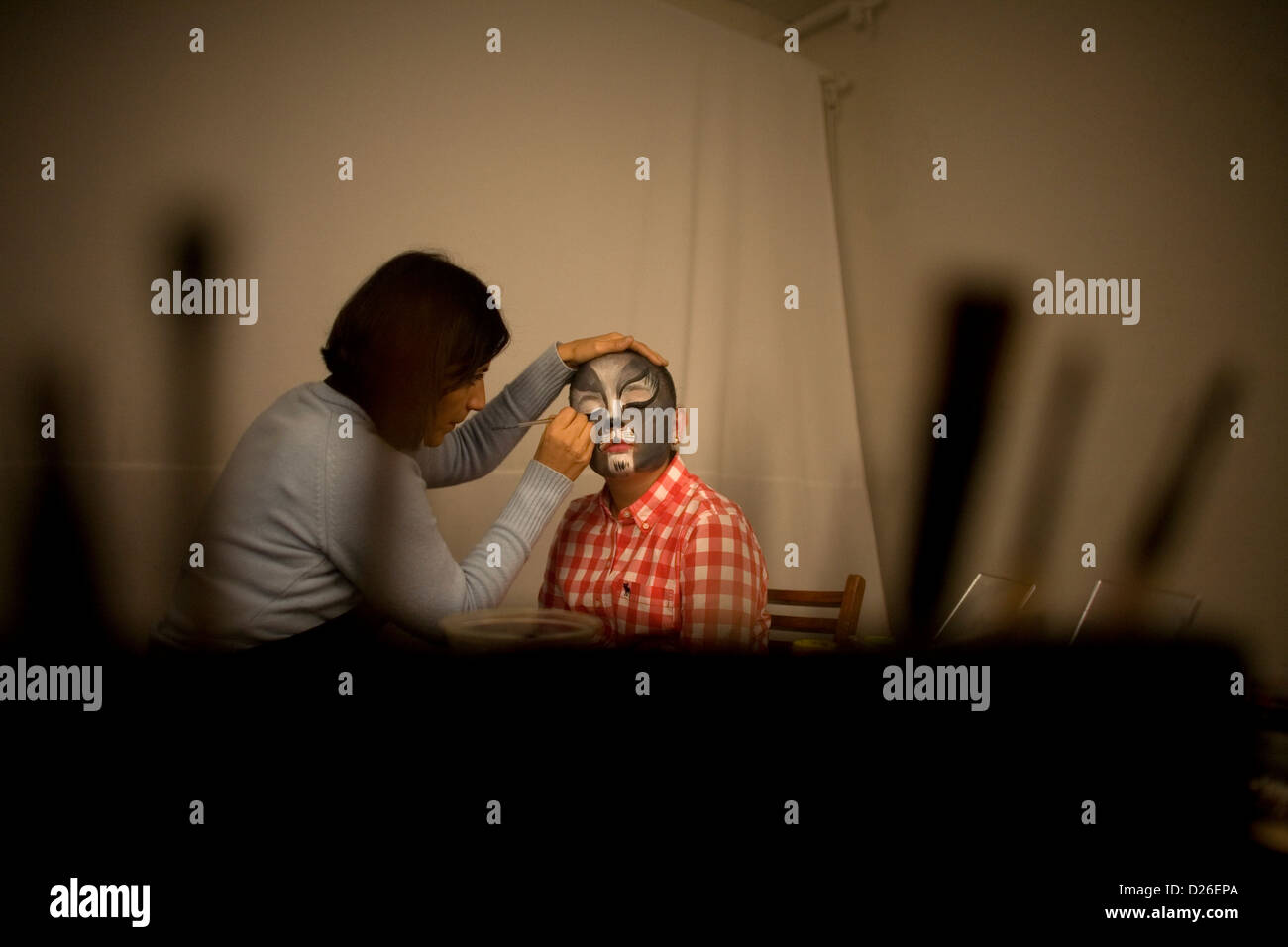 Make up artist Erika Monroy, founder of Akin Body Painting, paints a ...
