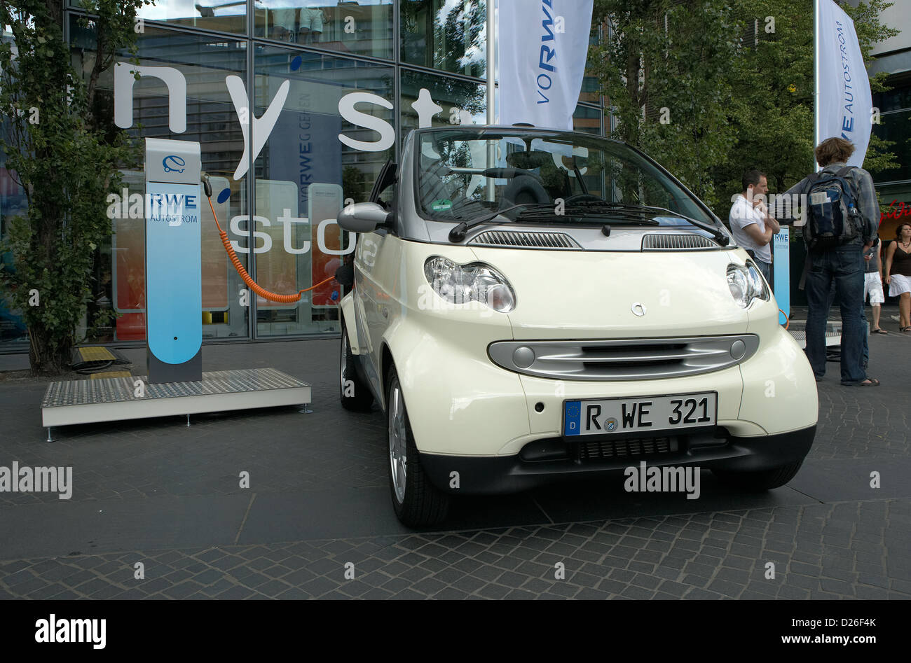 Berlin, Germany, a smart small car at a charging station by RWE car ...
