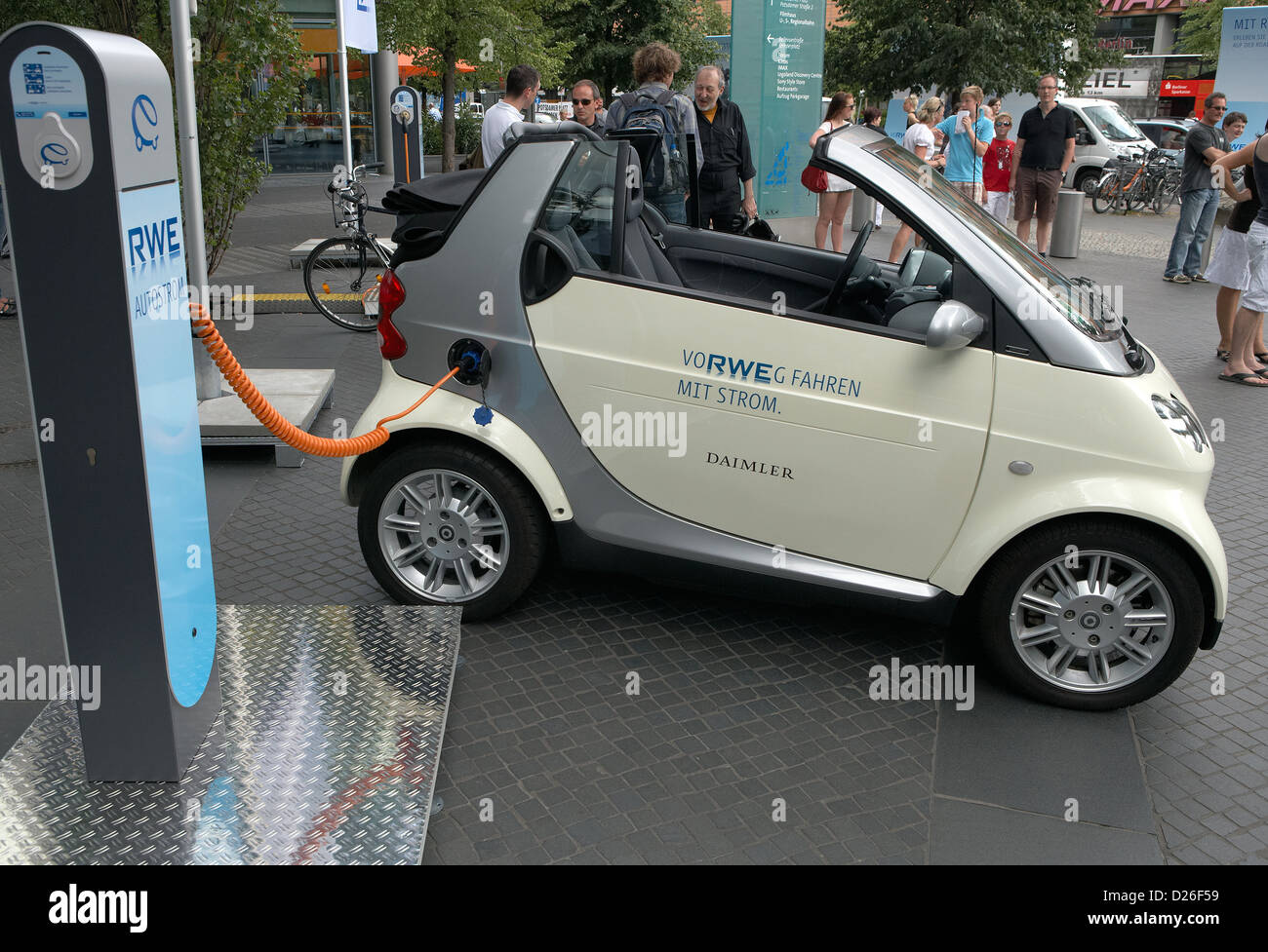 Berlin, Germany, a smart small car at a charging station by RWE car ...