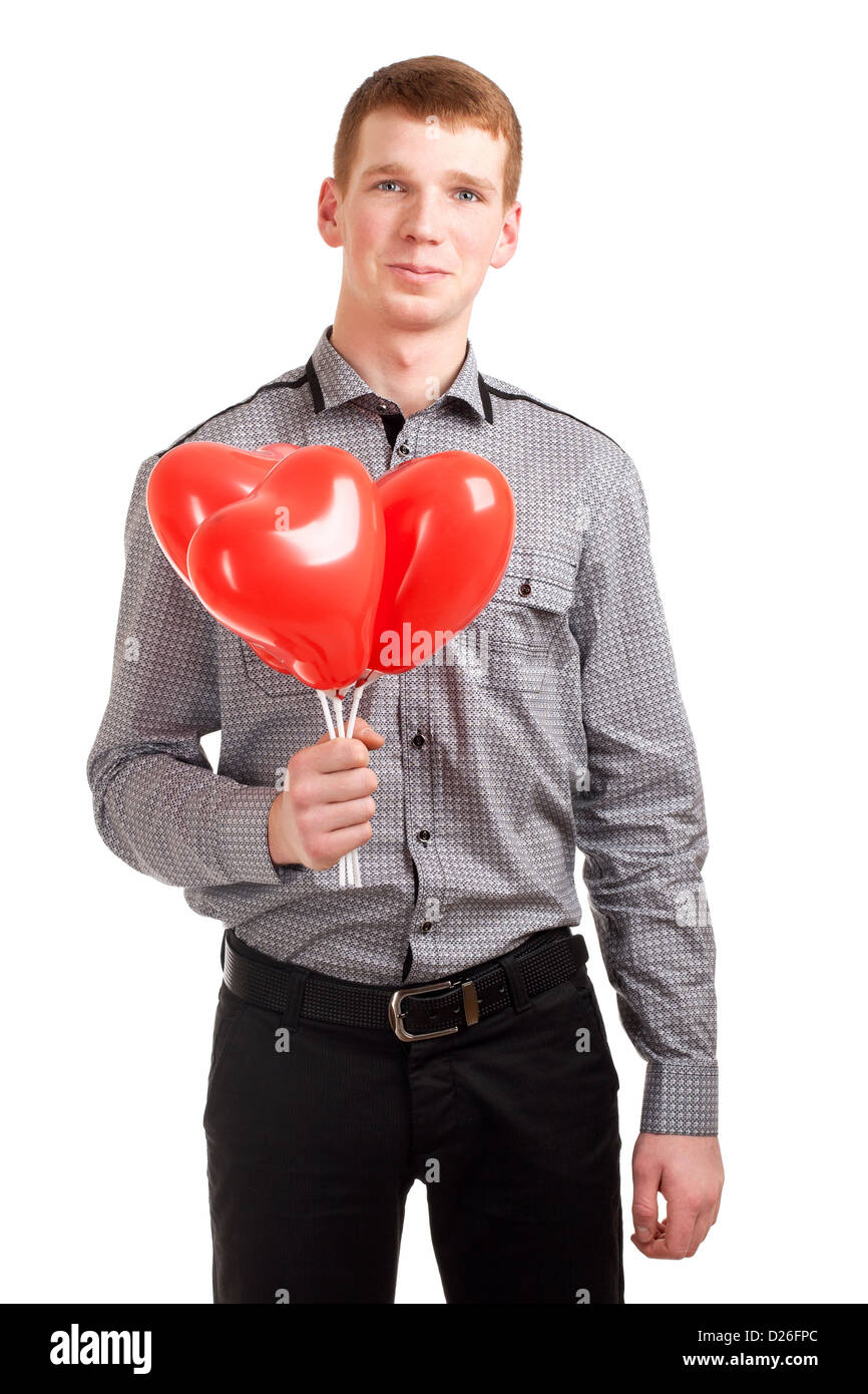 Portrait of a young man with balloons Stock Photo - Alamy