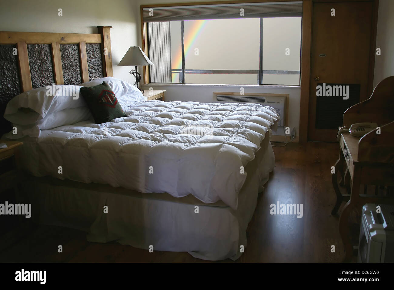 Rainbow seen through bedroom window Stock Photo - Alamy