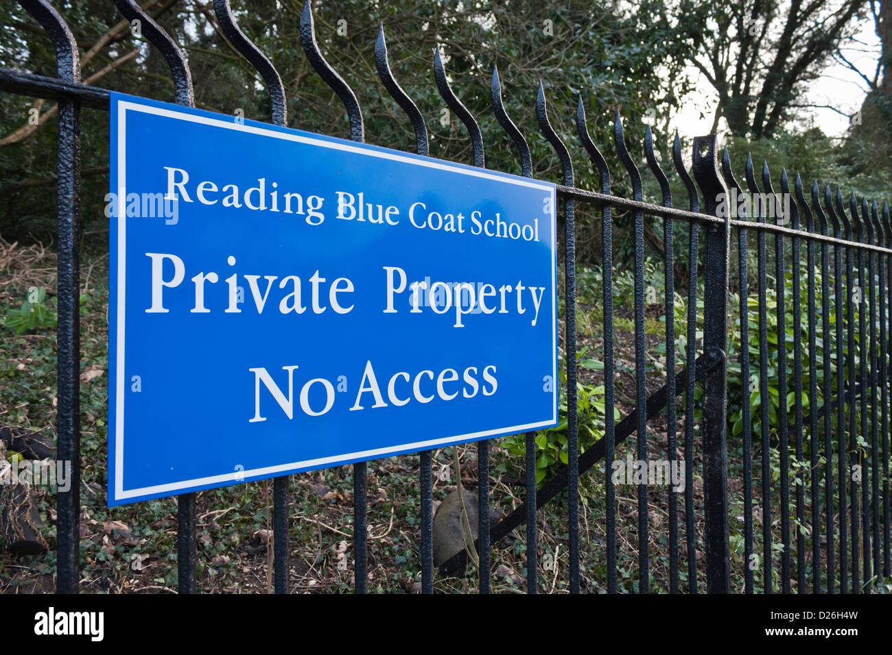 School sign on perimeter fence Stock Photo - Alamy