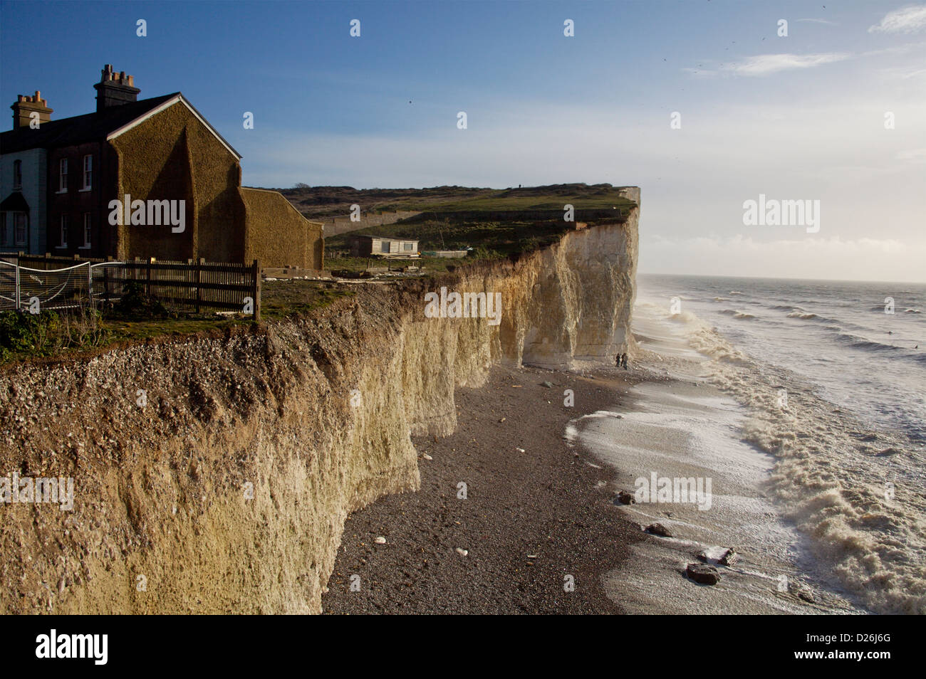 Houses on the edge of the chalk cliff, Birling Gap, East Sussex ...