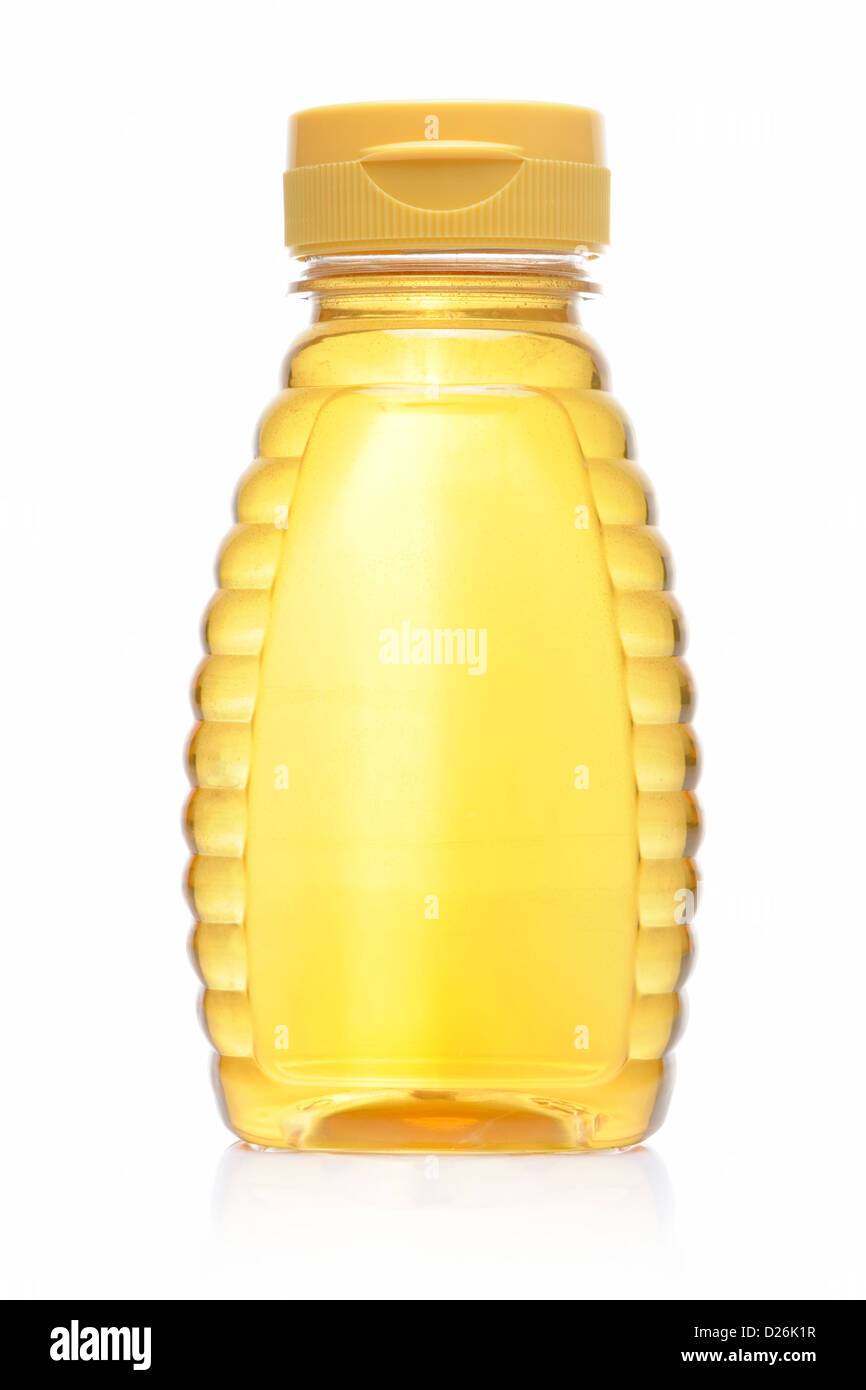 Bottle of honey Stock Photo - Alamy