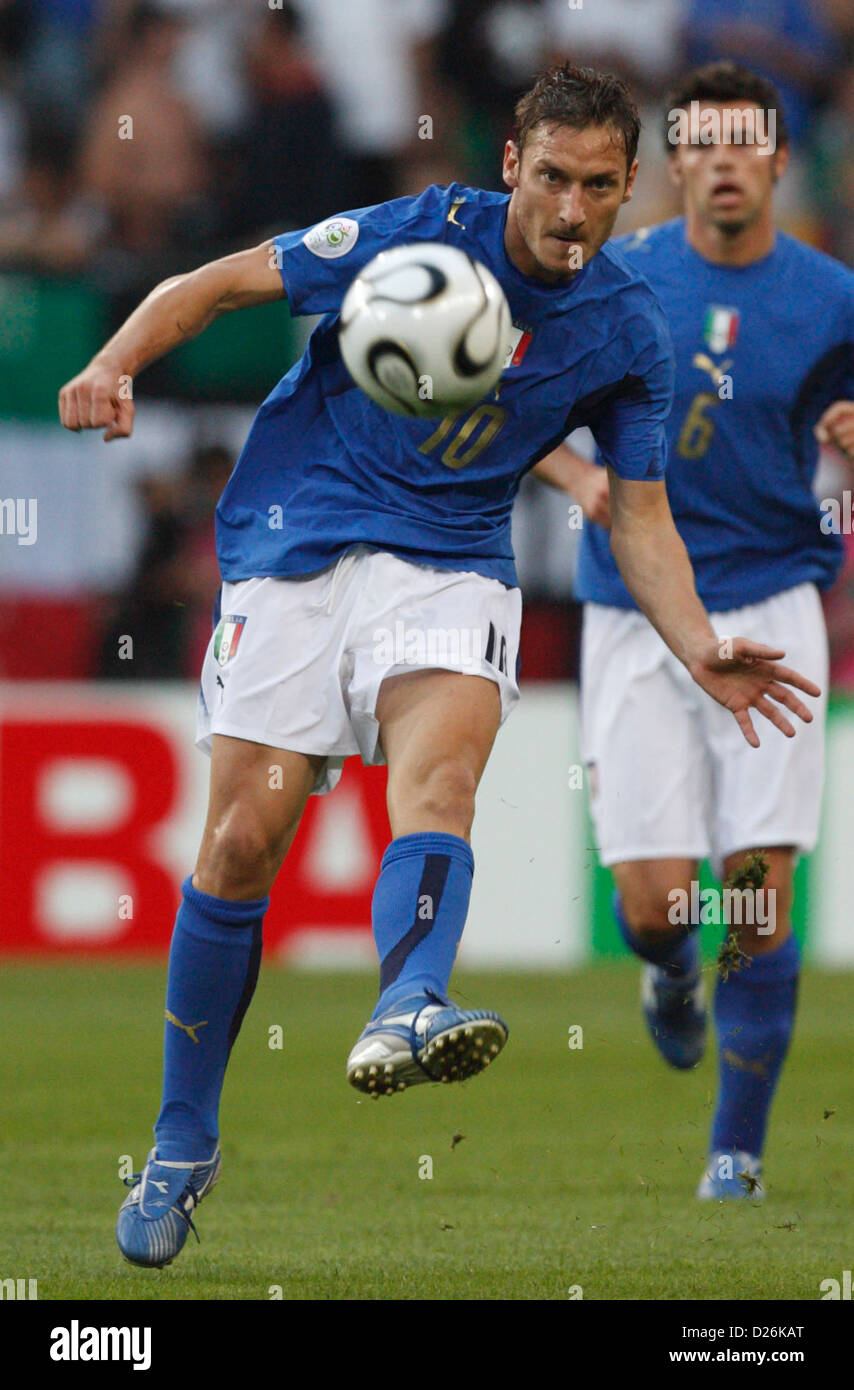 Francesco Totti of Italy passes the ball during a FIFA World Cup ...