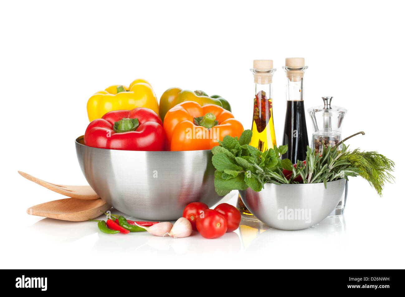 Fresh bell peppers, herbs and condiments. Isolated on white background ...
