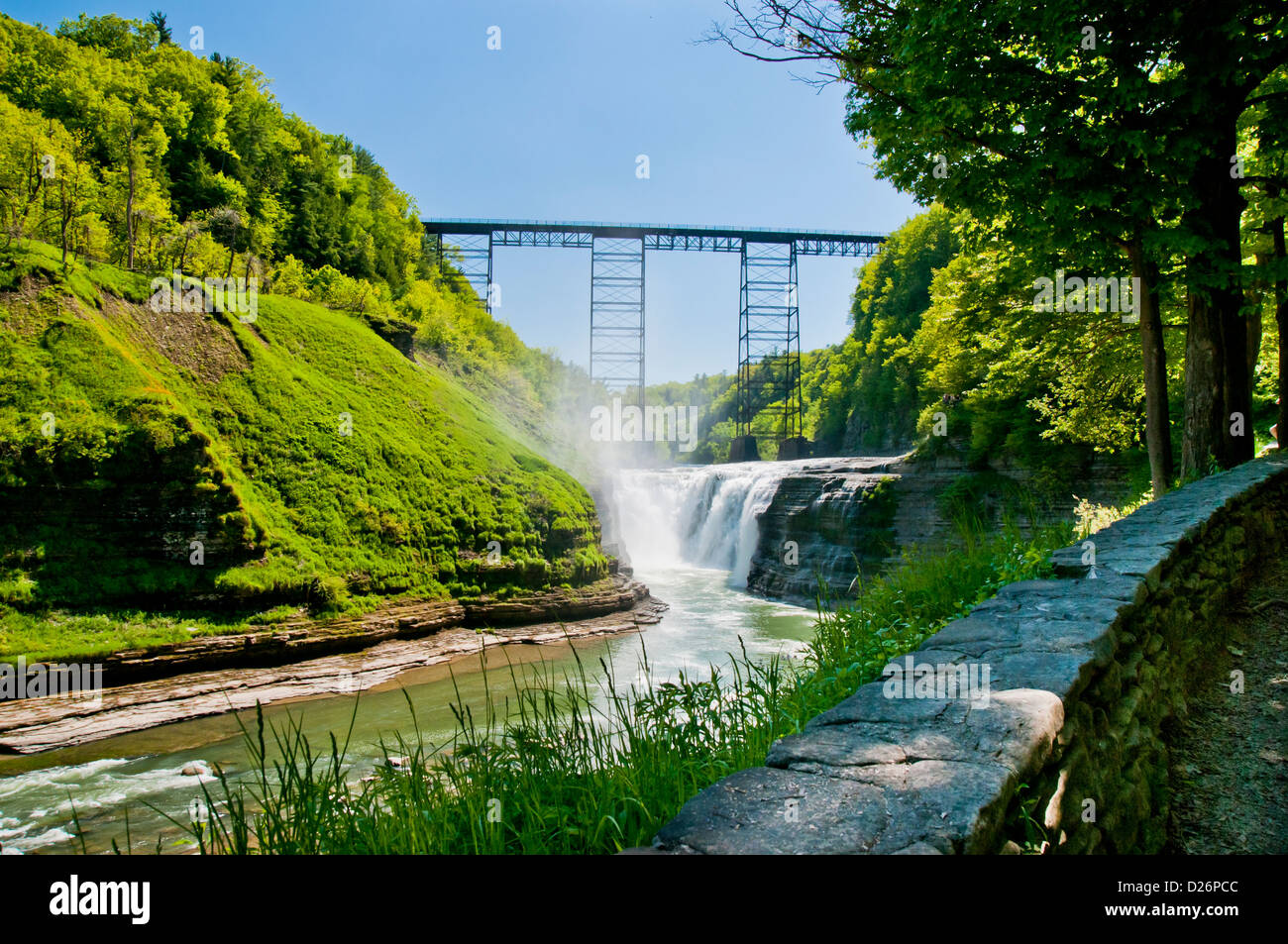Wide angle of Letchworths upper falls and high level train bridge Stock ...