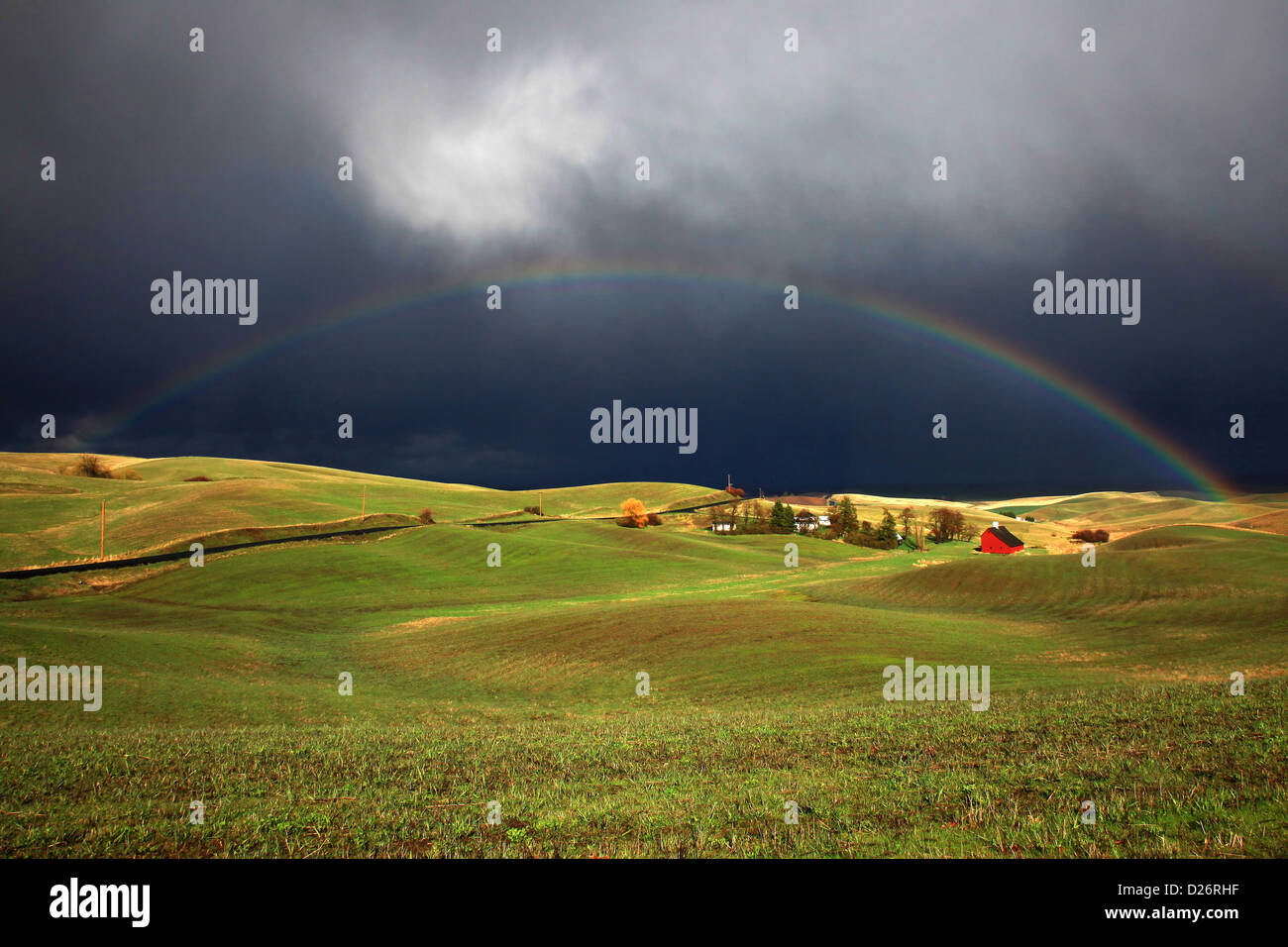 Full arc rainbow over Idaho farm Stock Photo - Alamy