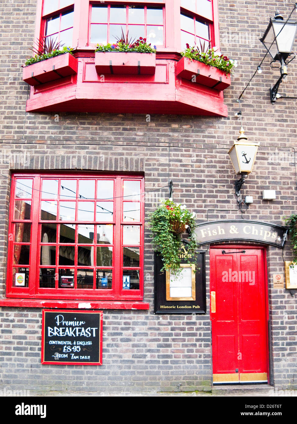 Red painted pub, Southwark London England UK Stock Photo - Alamy