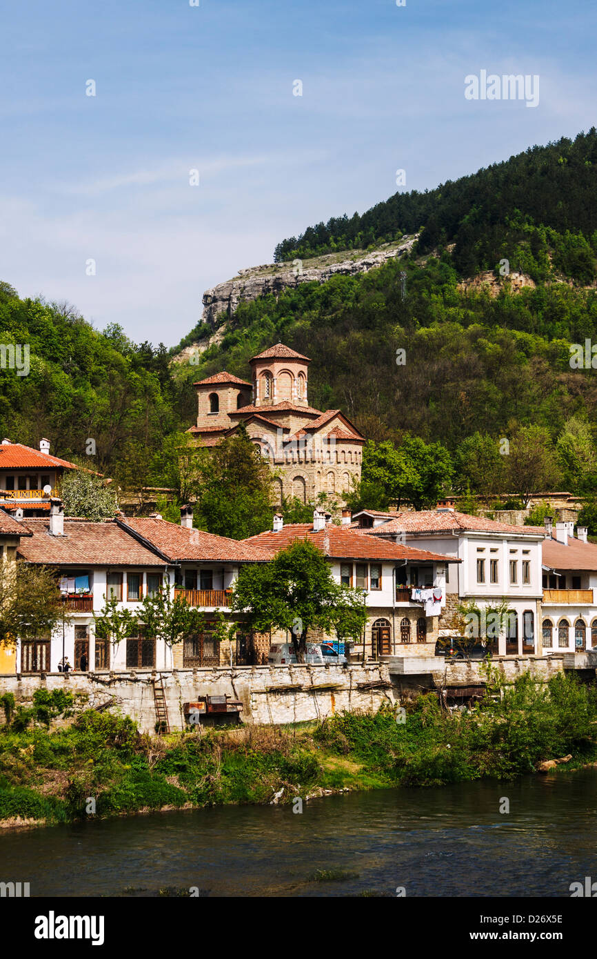 Traditional houses by the Yantra river and St. Dimitar church, the ...