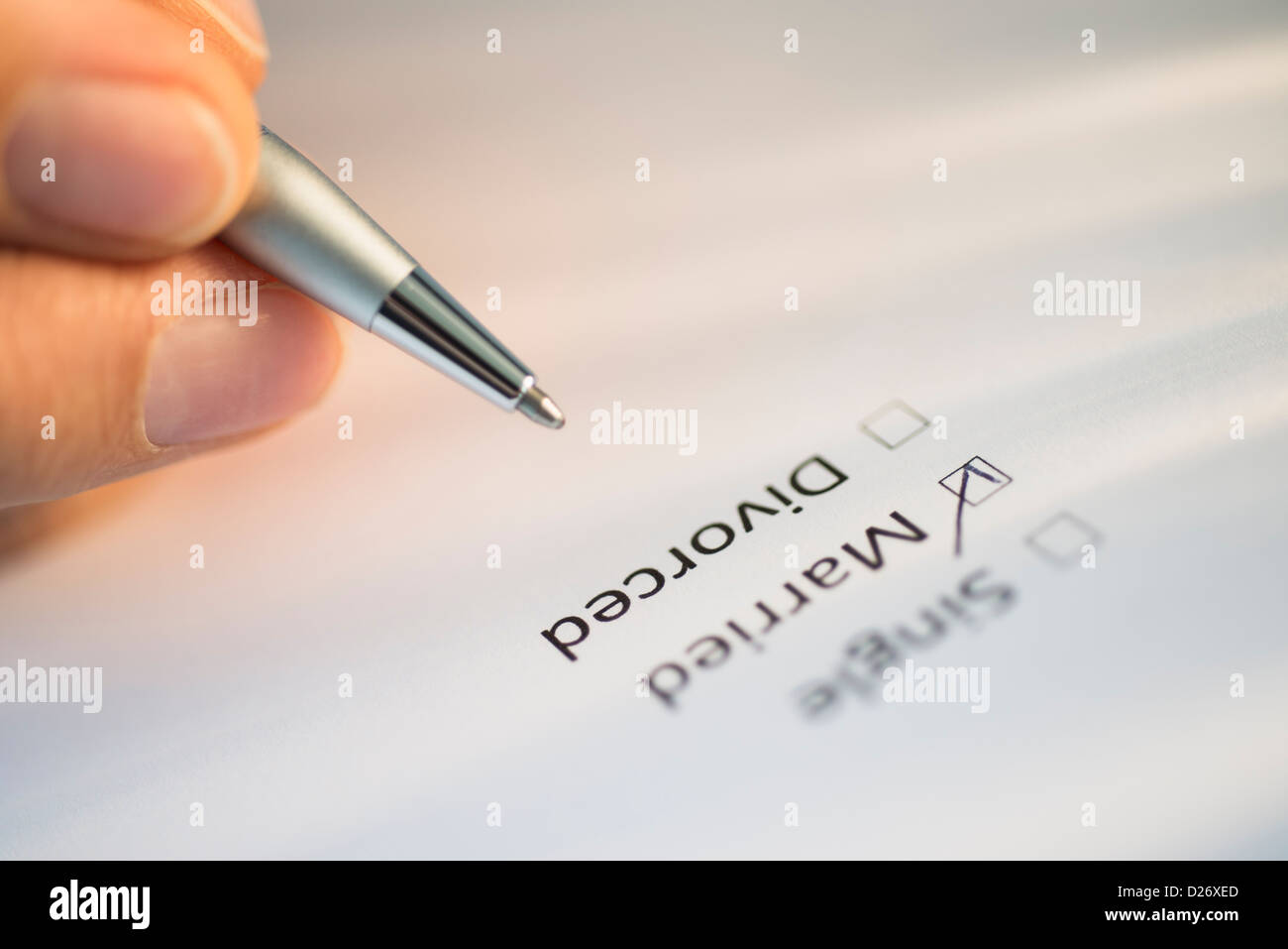 Close-up of hand filling out form Stock Photo - Alamy