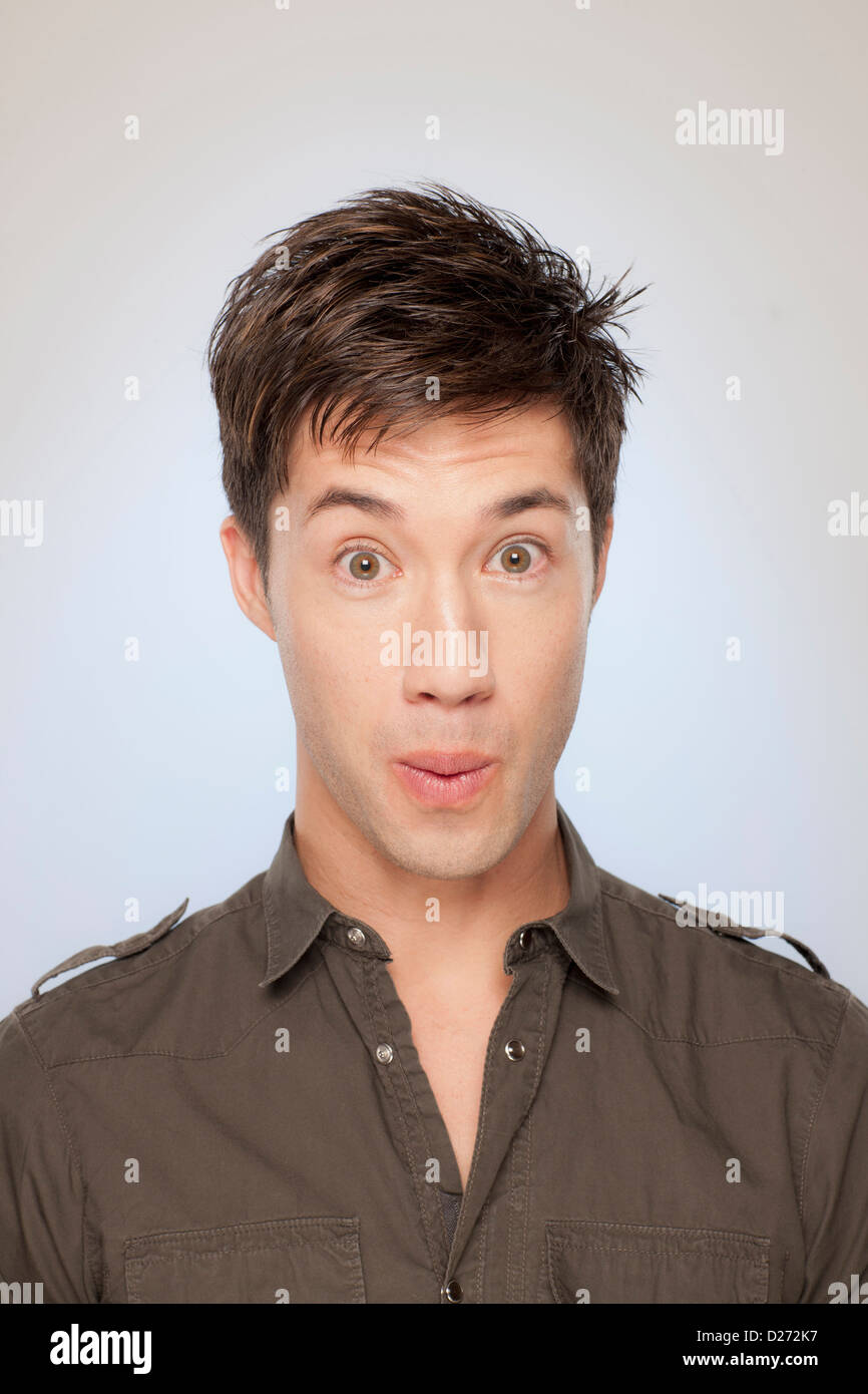 Portrait of surprised man Stock Photo - Alamy