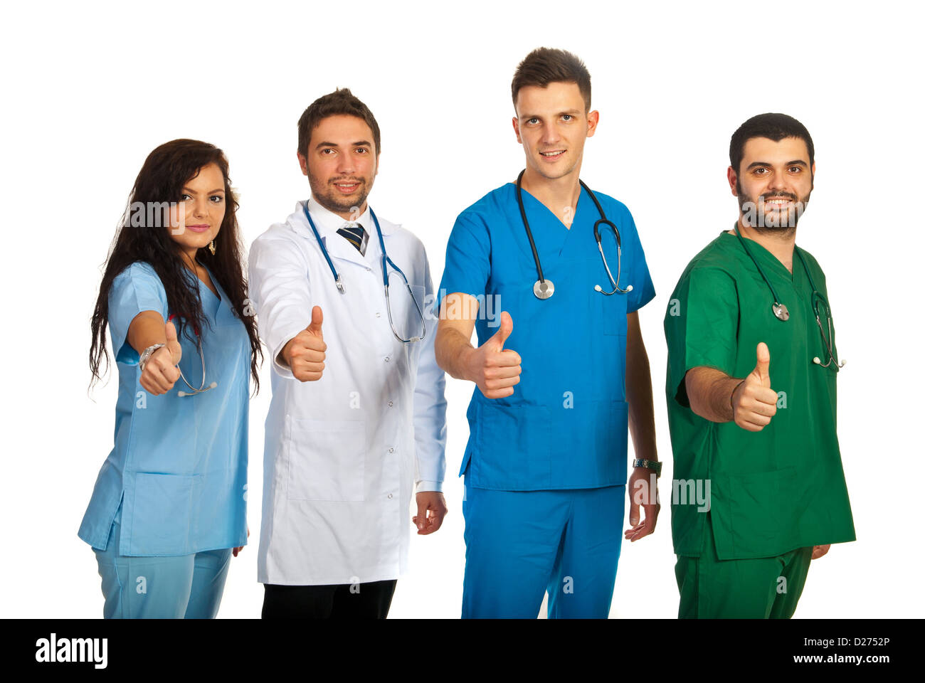 Successful team of doctors standing in a line and giving thumbs up ...
