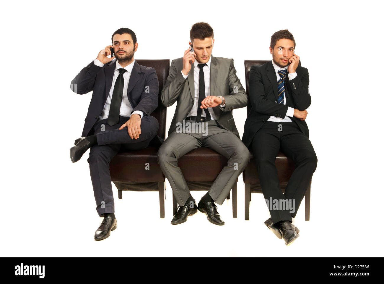 Business men sitting on chairs in a line and having conversation ...