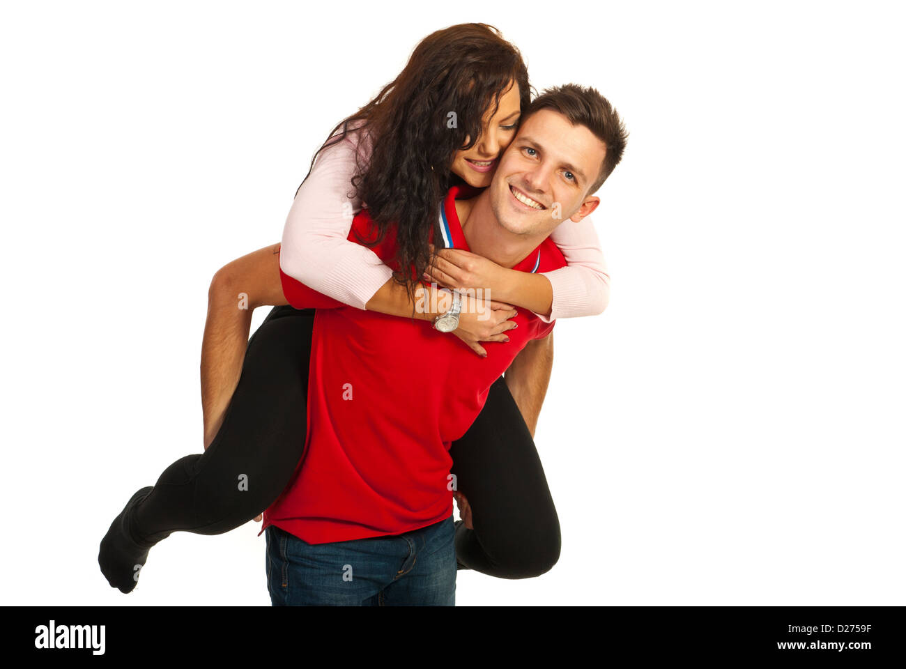 Loving happy couple in piggy back isolated on white background Stock ...