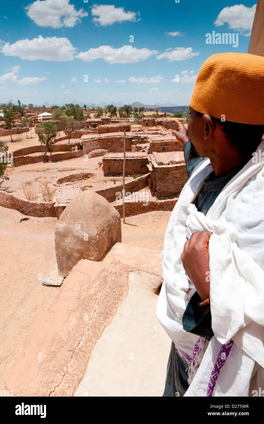 An Orthodox Christian priest in the bell-tower at the cliff-top ...