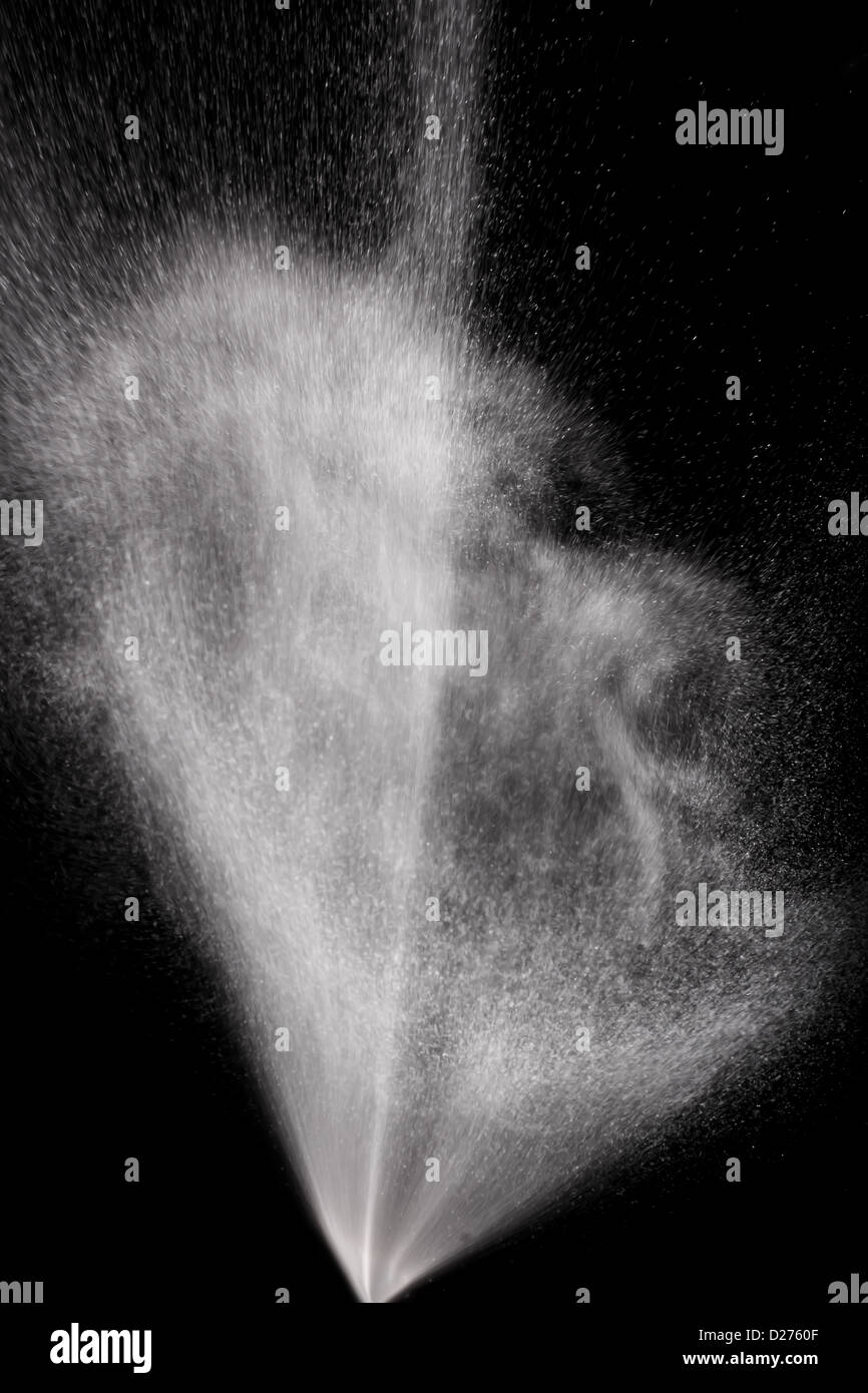 Highspeed Photography of Explosion of Water Filled Spray on black ...