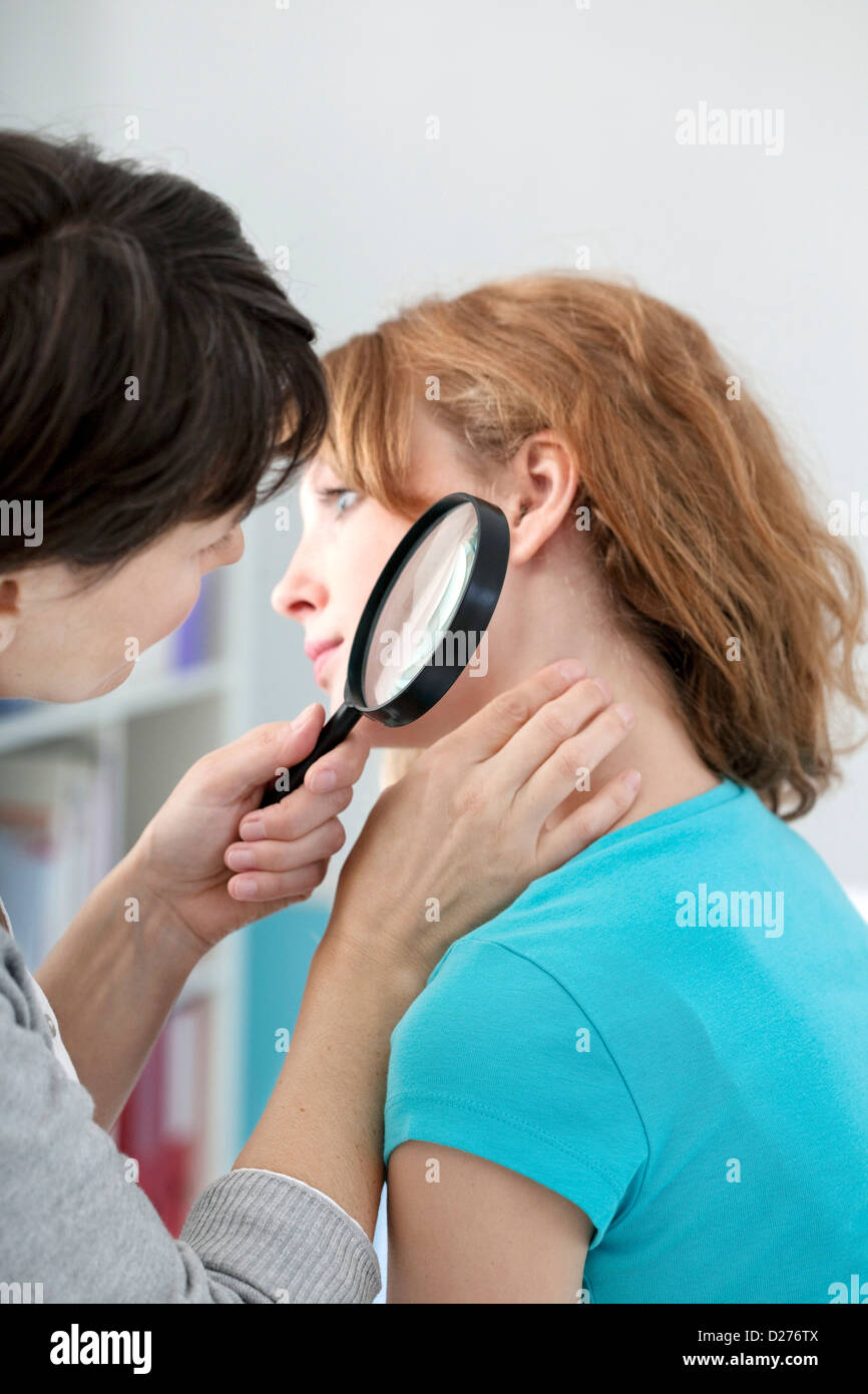 DERMATOLOGY CONSULTATION WOMAN Stock Photo - Alamy