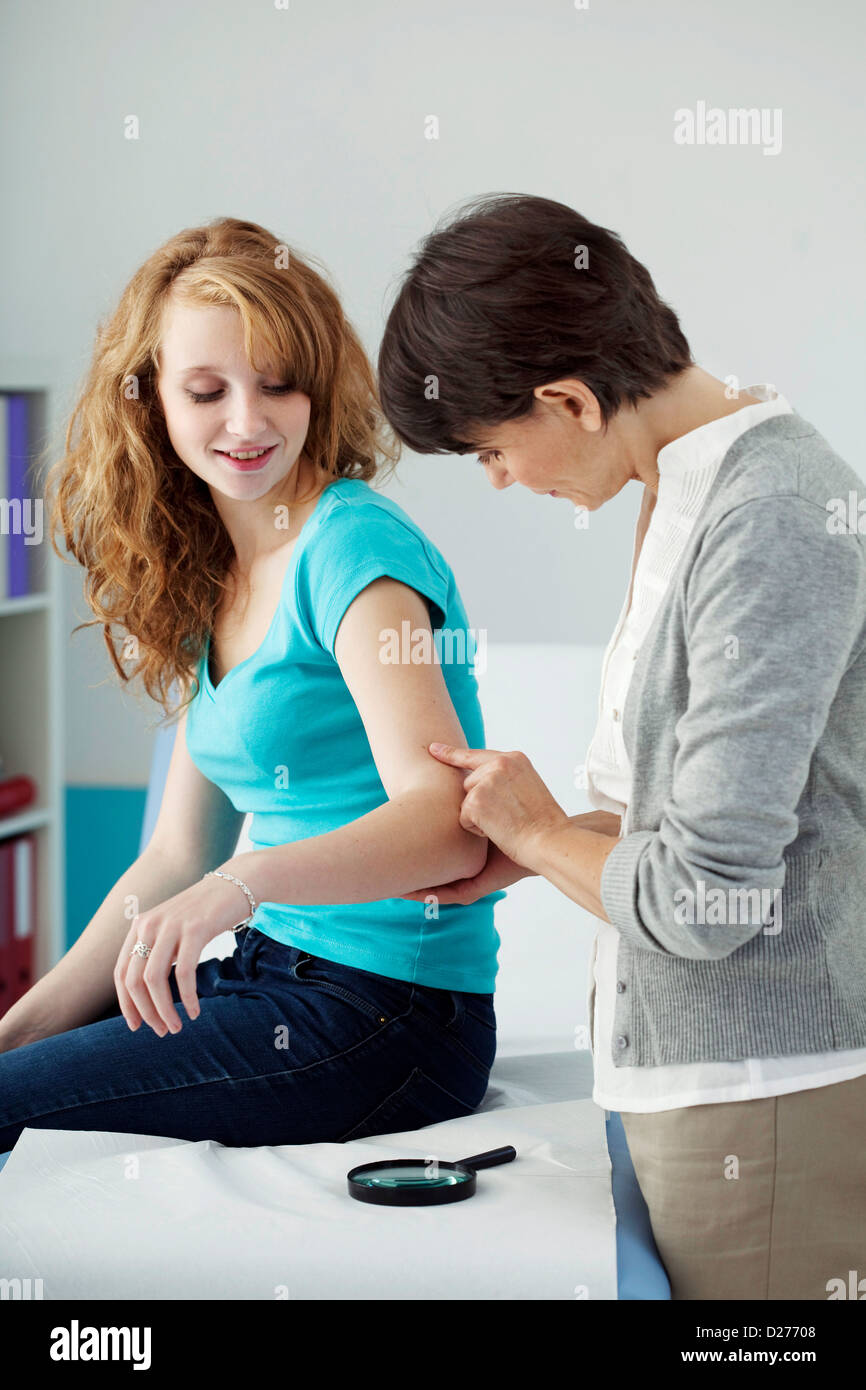 DERMATOLOGY CONSULTATION WOMAN Stock Photo - Alamy