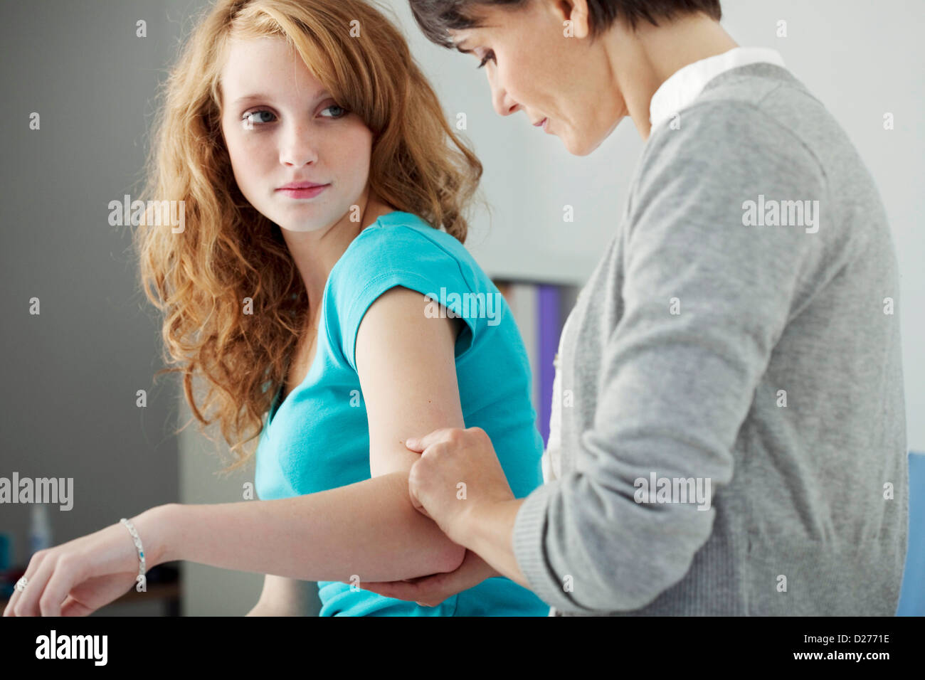 DERMATOLOGY CONSULTATION WOMAN Stock Photo - Alamy