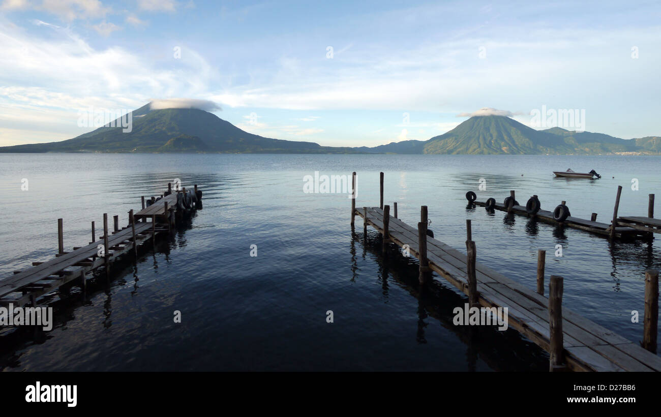 Guatemala - Lake Atitlan early morning, volcanoes in background Stock ...