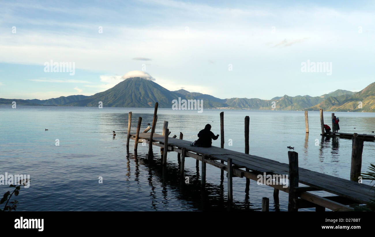 Guatemala - Lake Atitlan early morning, volcanoes in background Stock ...