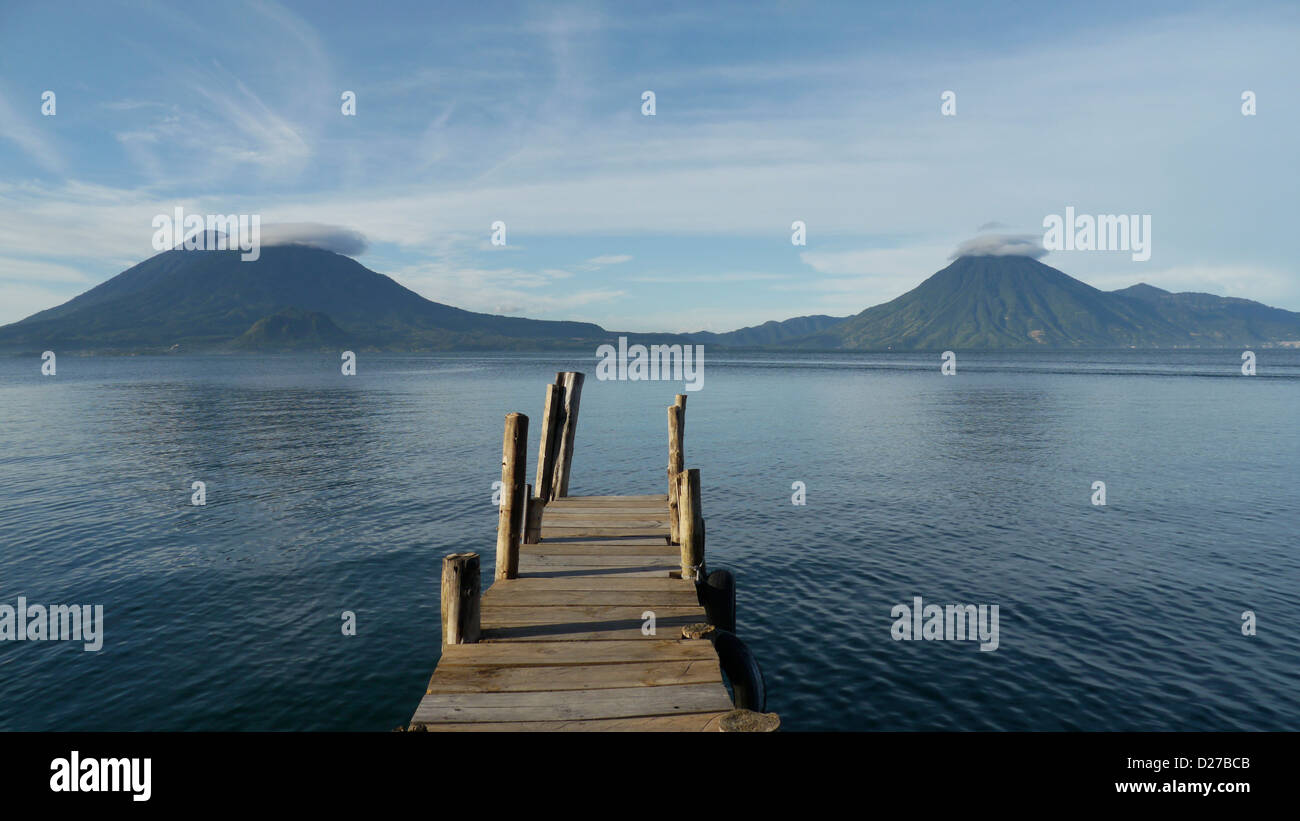 Guatemala - Lake Atitlan early morning, volcanoes in background Stock ...