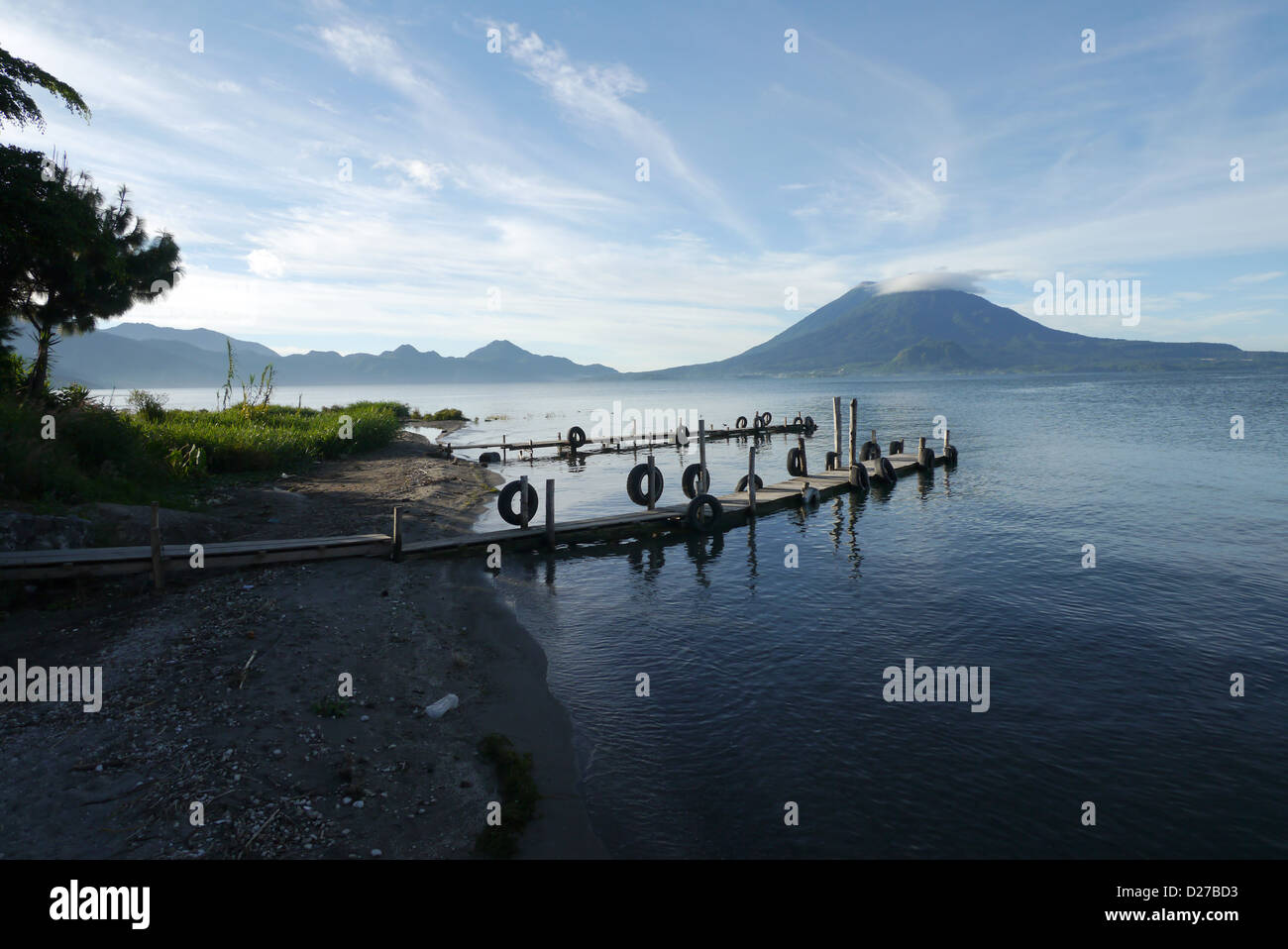 Guatemala - Lake Atitlan early morning, volcanoes in background Stock ...