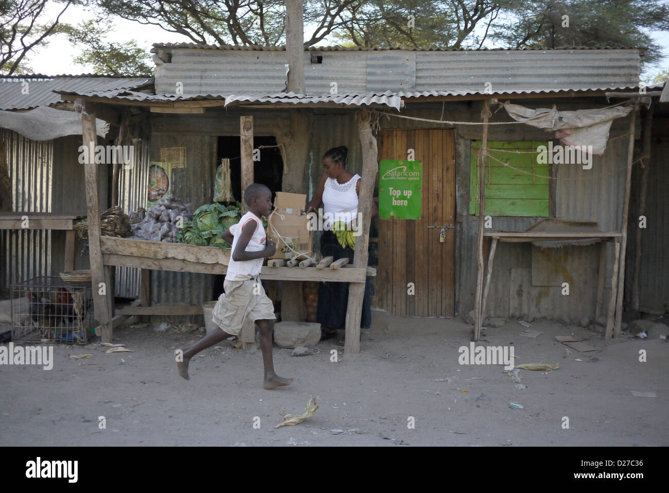 KENYA Street scenes in Lodwar. Small shop selling vegetables. photo by ...