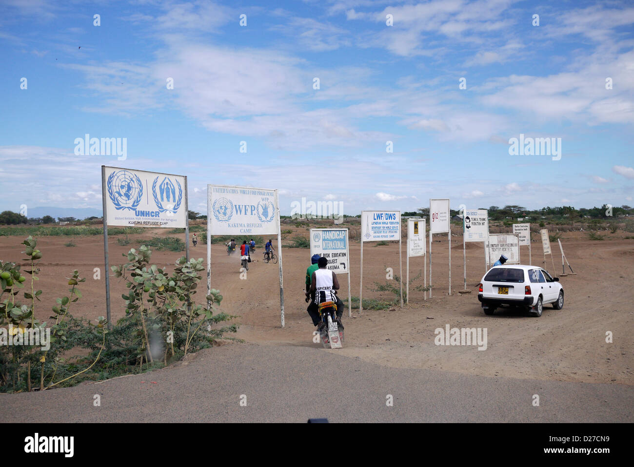 KENYA Signs for various NGOs on the road outside the refugee camp at ...