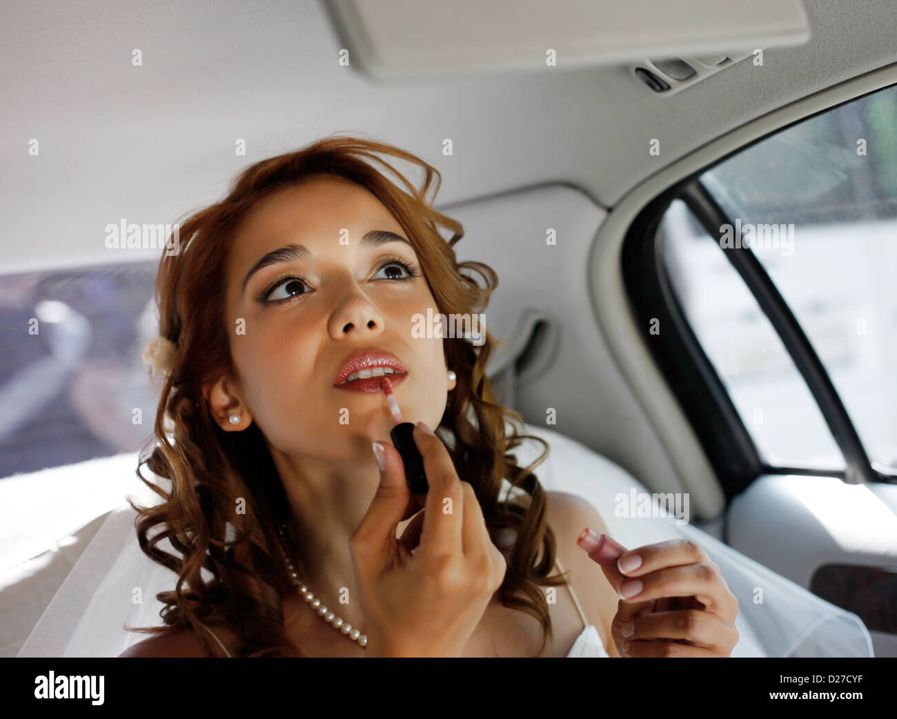 The beautiful bride in the automobile Stock Photo - Alamy