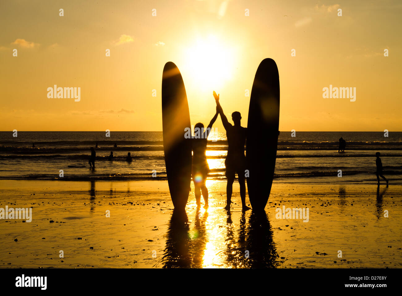Surfboards On The Beach At Sunset