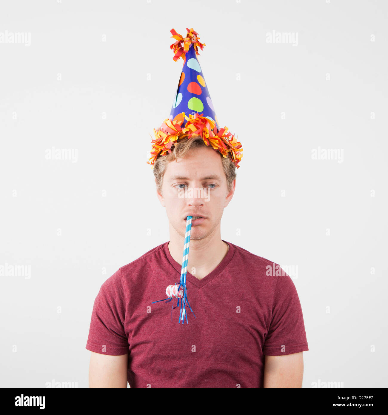 Young man party hat hi-res stock photography and images - Alamy