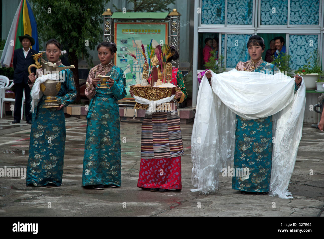 Tibetan (center) and Chinese dancers welcoming tourists at hotel in ...