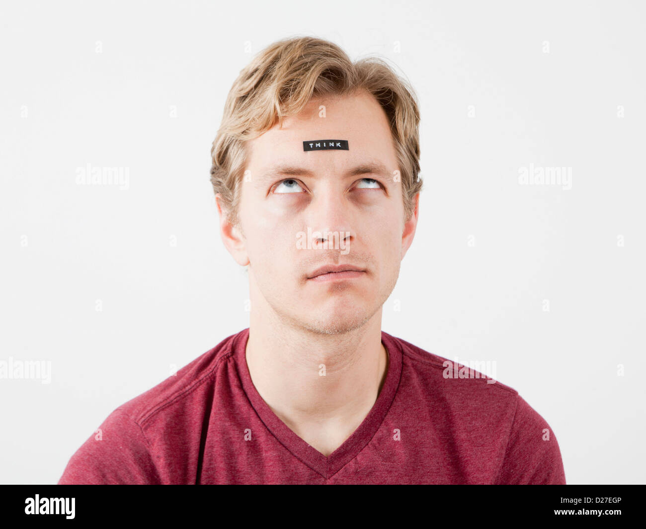 Man with sticker on his forehead Stock Photo - Alamy