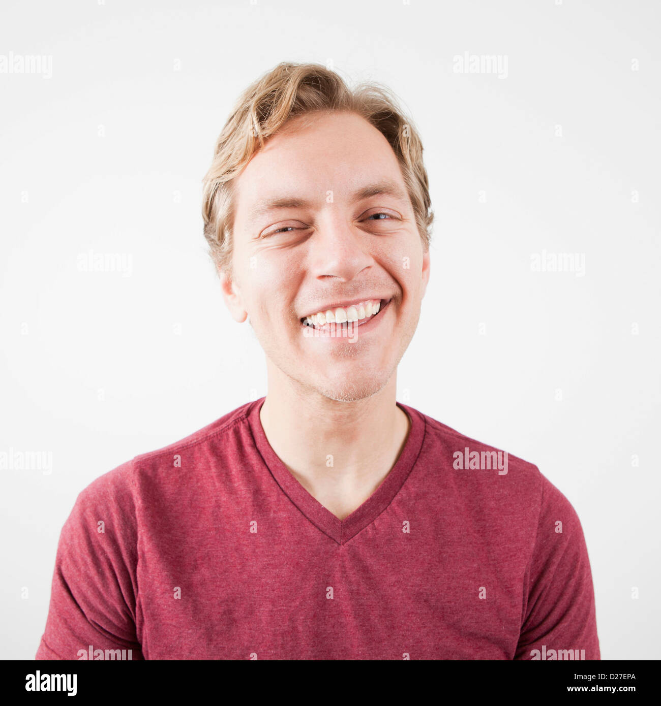 Studio Shot of mid adult man expressing happiness Stock Photo - Alamy