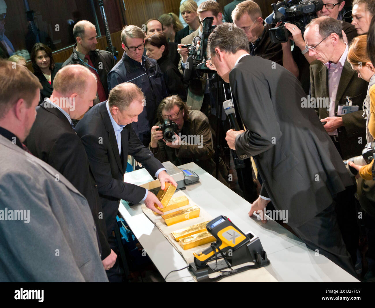 Frankfurt Main, Germany, 16th January 2013. A Bundesbank employee piles ...