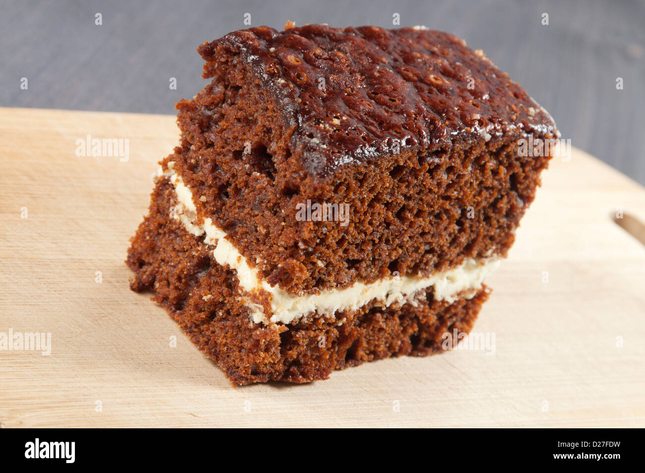 Prague home cake with cream on a board Stock Photo - Alamy