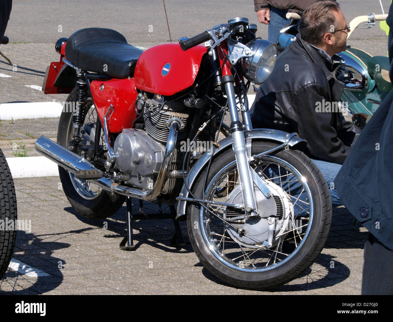 The Red Benelli motorcycle is a stylish Italian-made bike known for its ...