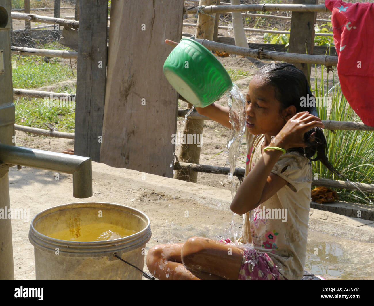 Cambodia children washing well hi-res stock photography and images - Alamy
