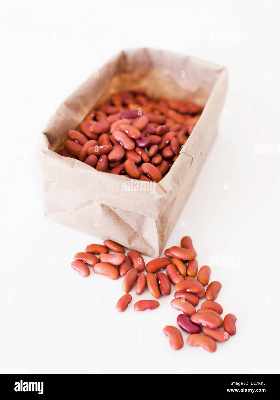 Carton of kidney beans on white background Stock Photo - Alamy