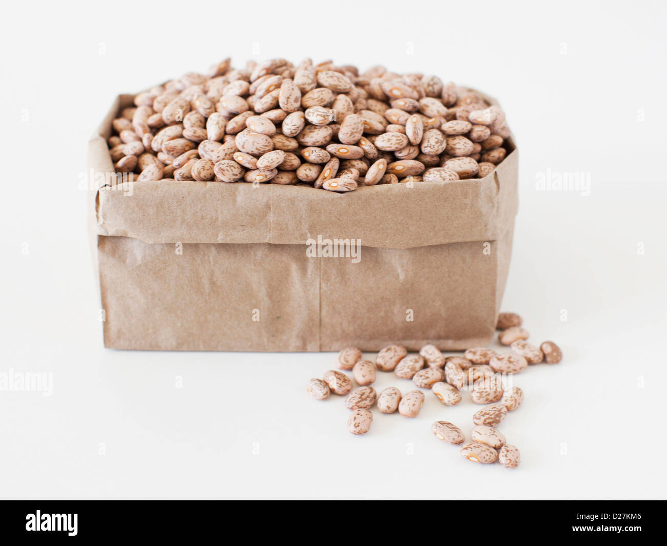 Carton of beans on white background Stock Photo - Alamy